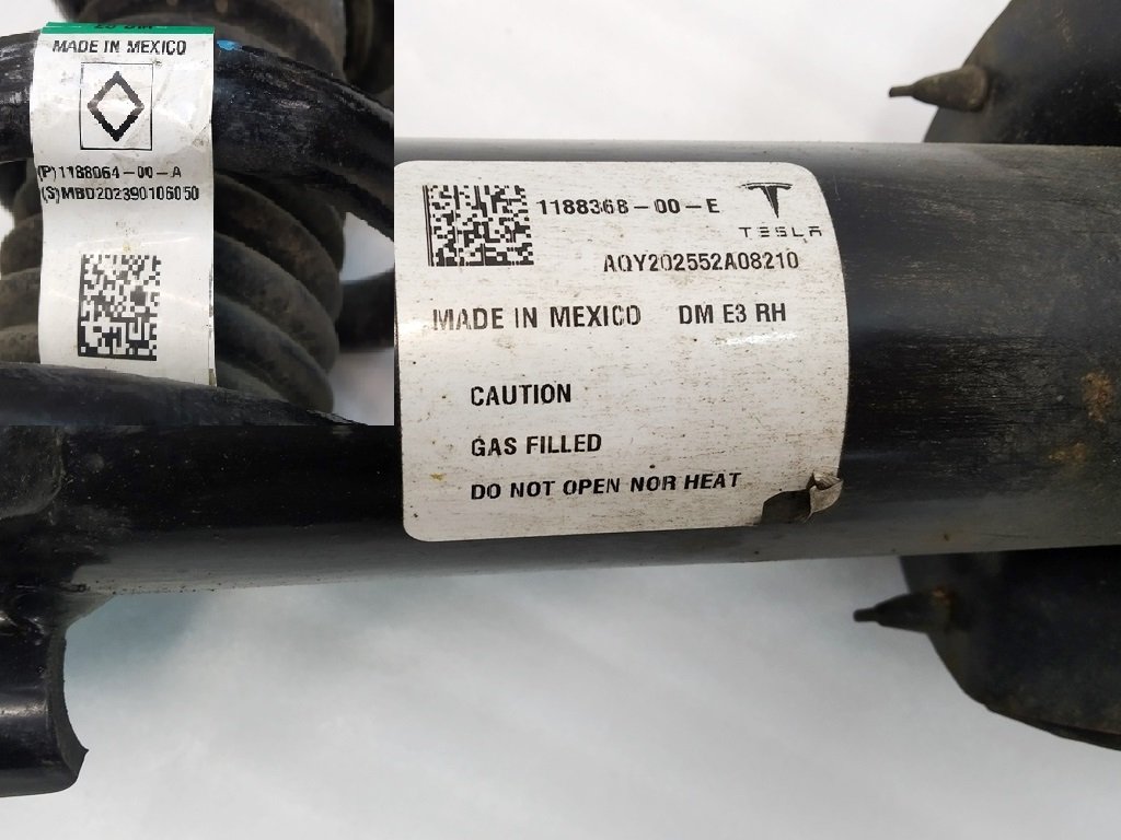 Damper assembly coil E3 - Dual motor - Front Right Hand Tesla Model Y ...